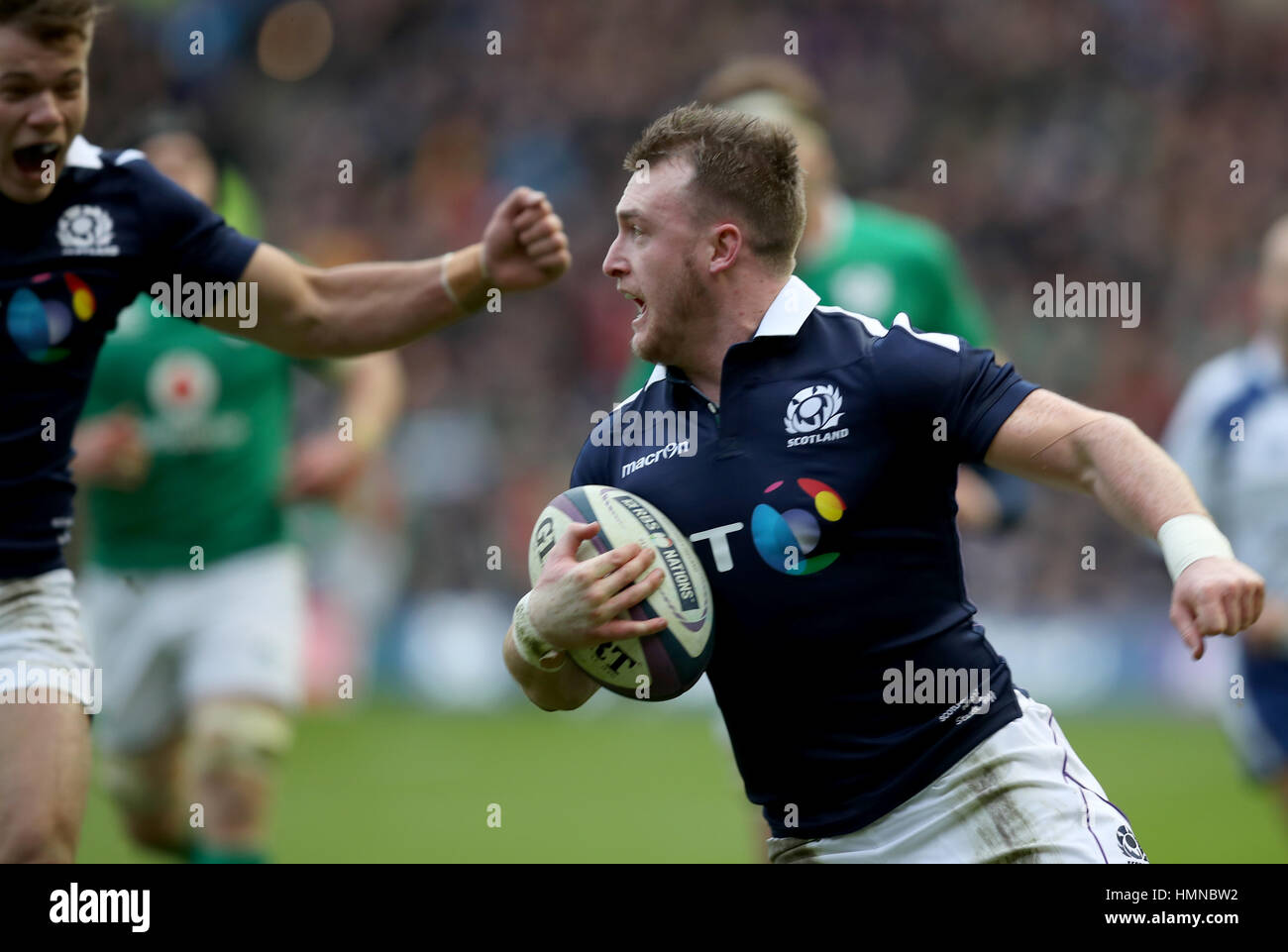 Scotlands stuart hogg runs hi-res stock photography and images - Alamy