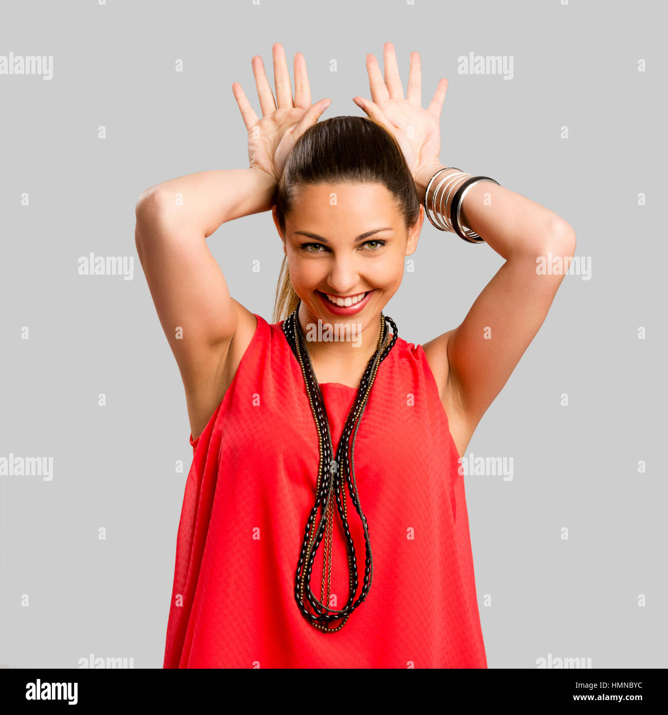Portrait of a beautiful woman making a silly face Stock Photo - Alamy