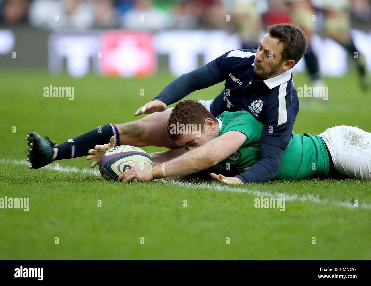 Ireland's Paddy Jackson scores a try in the second half during the RBS ...