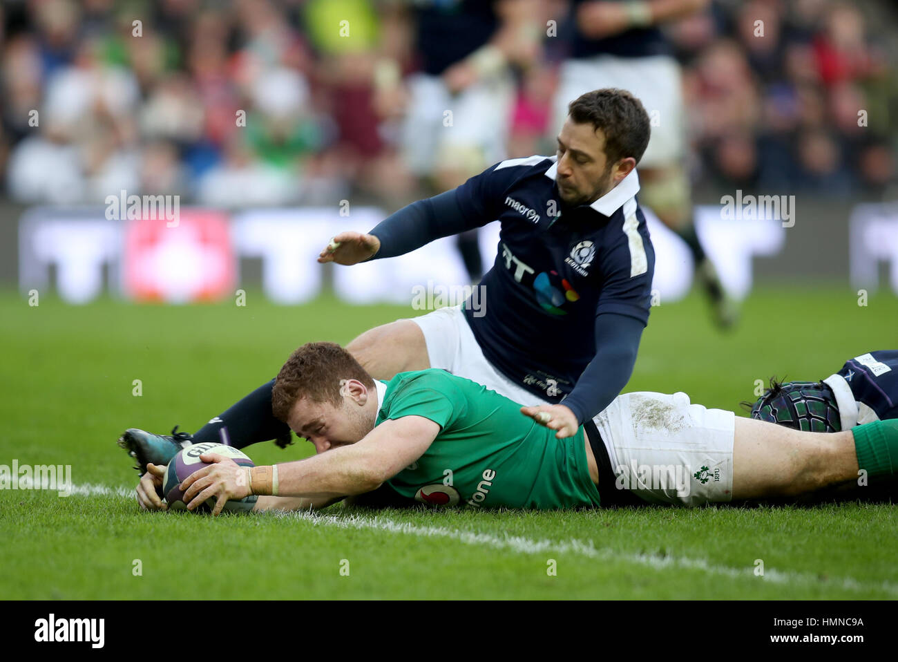 Ireland's Paddy Jackson scores a try in the second half during the RBS ...