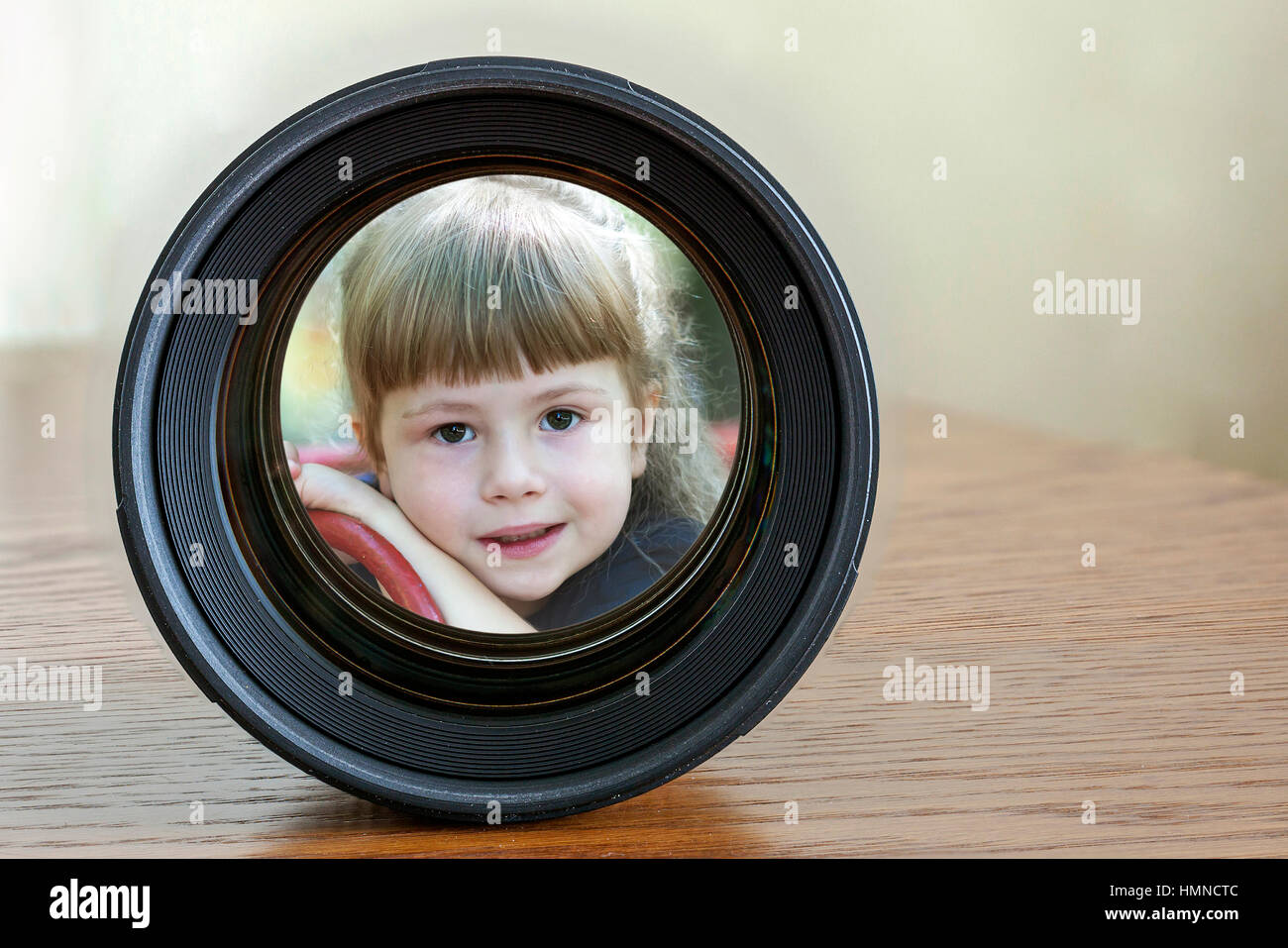 Camera portrait fix focus photo lens on dark wooden background with ...
