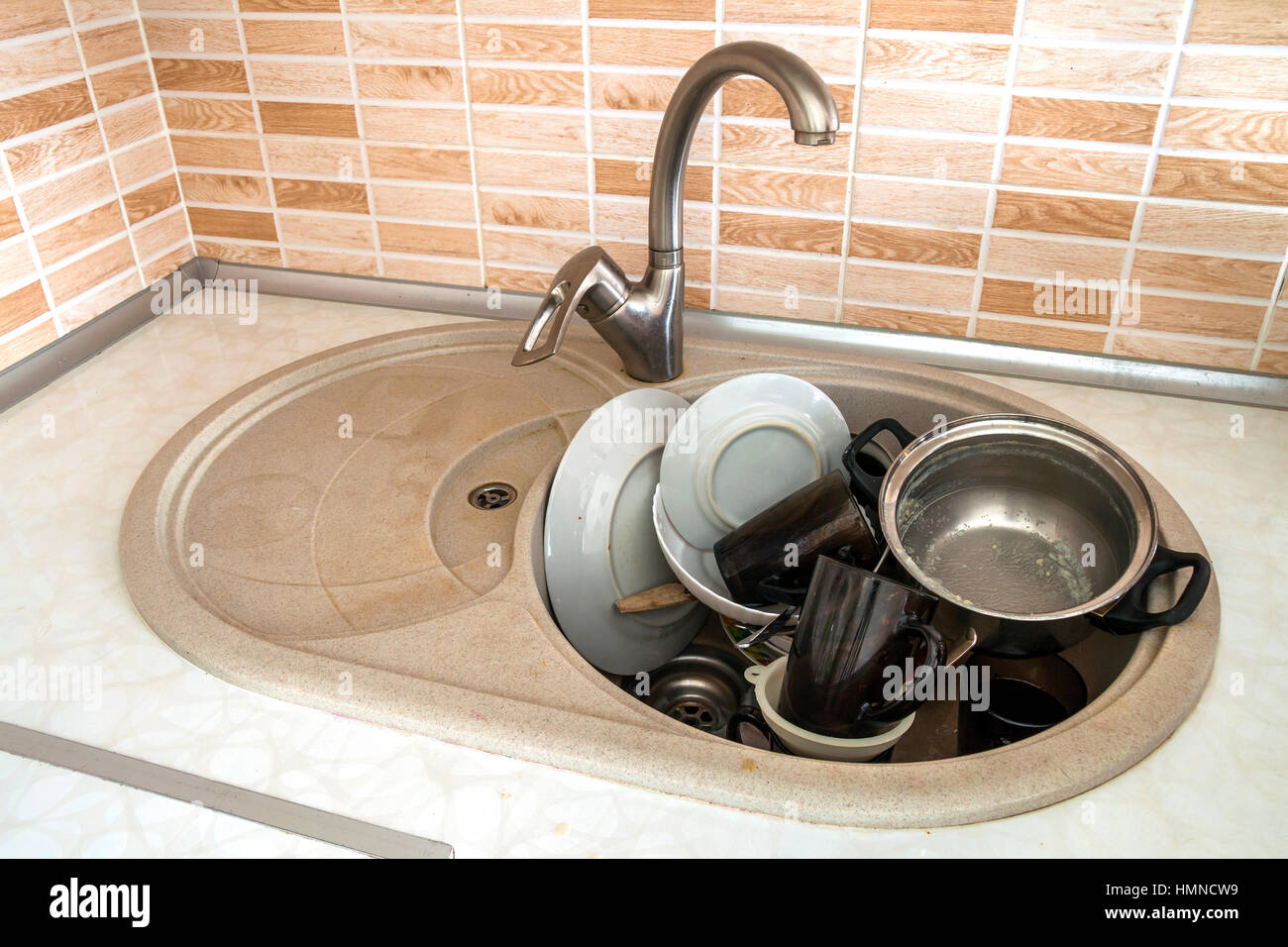 Stack Dirty Dishes In Sink Stock Photos & Stack Dirty Dishes In Sink ...