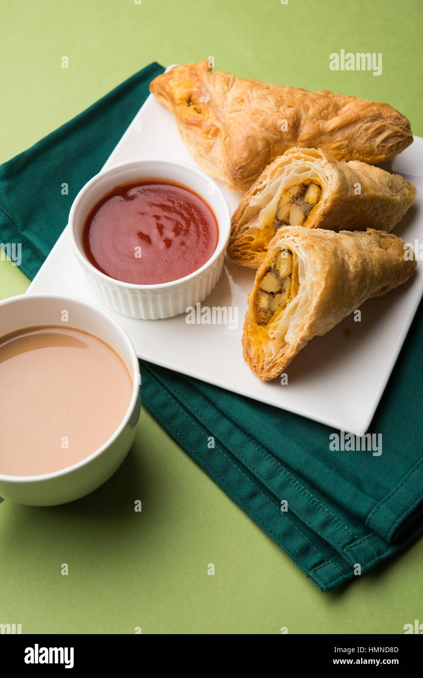 stuffed vegetable or veg puff or puf or samosa, famous indian snack ...