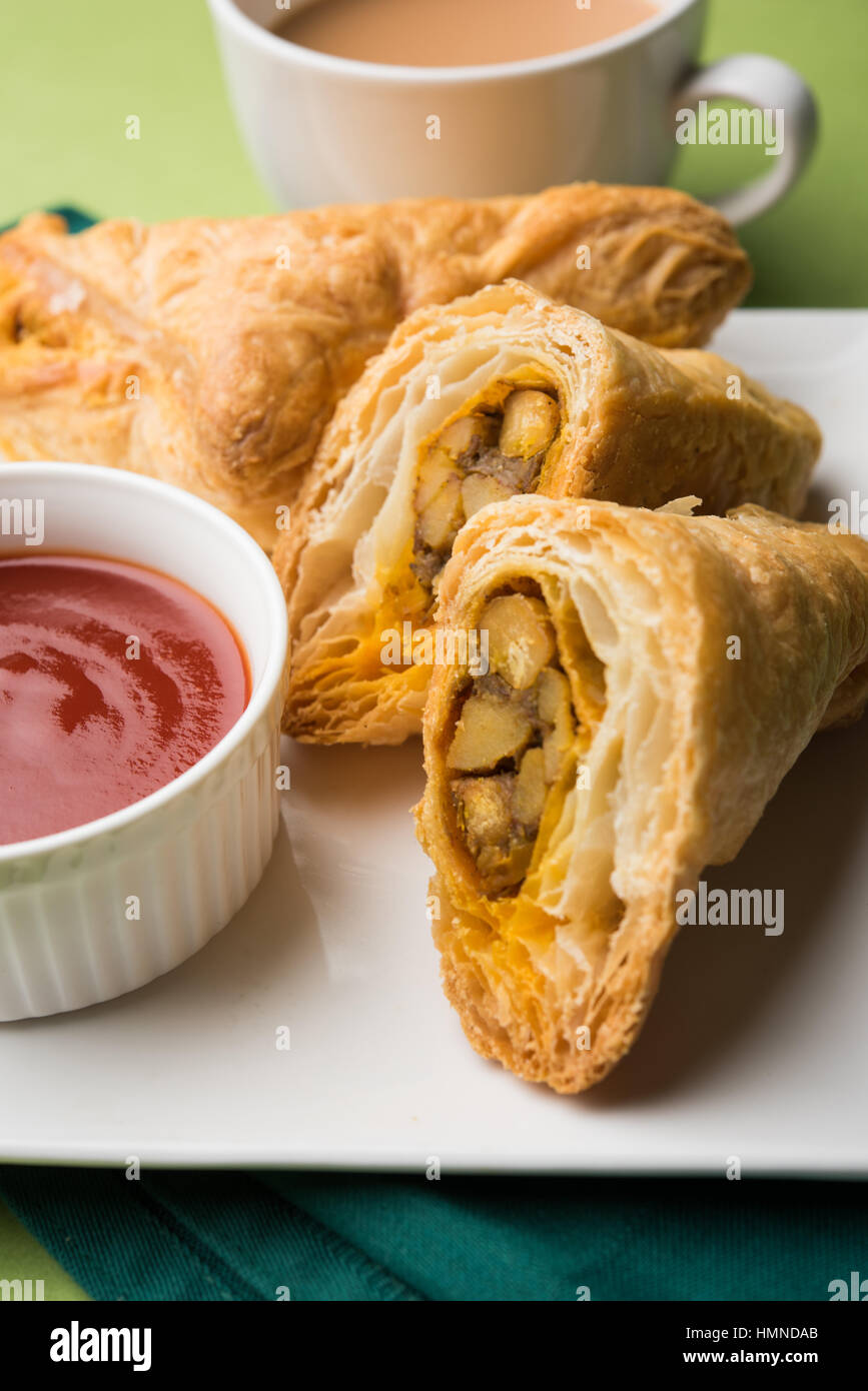 stuffed vegetable or veg puff or puf or samosa, famous indian snack ...