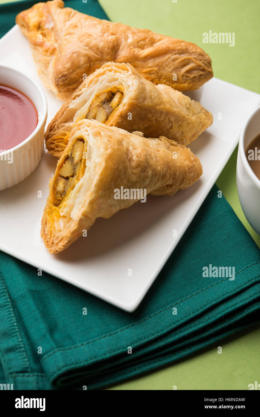 stuffed vegetable or veg puff or puf or samosa, famous indian snack ...