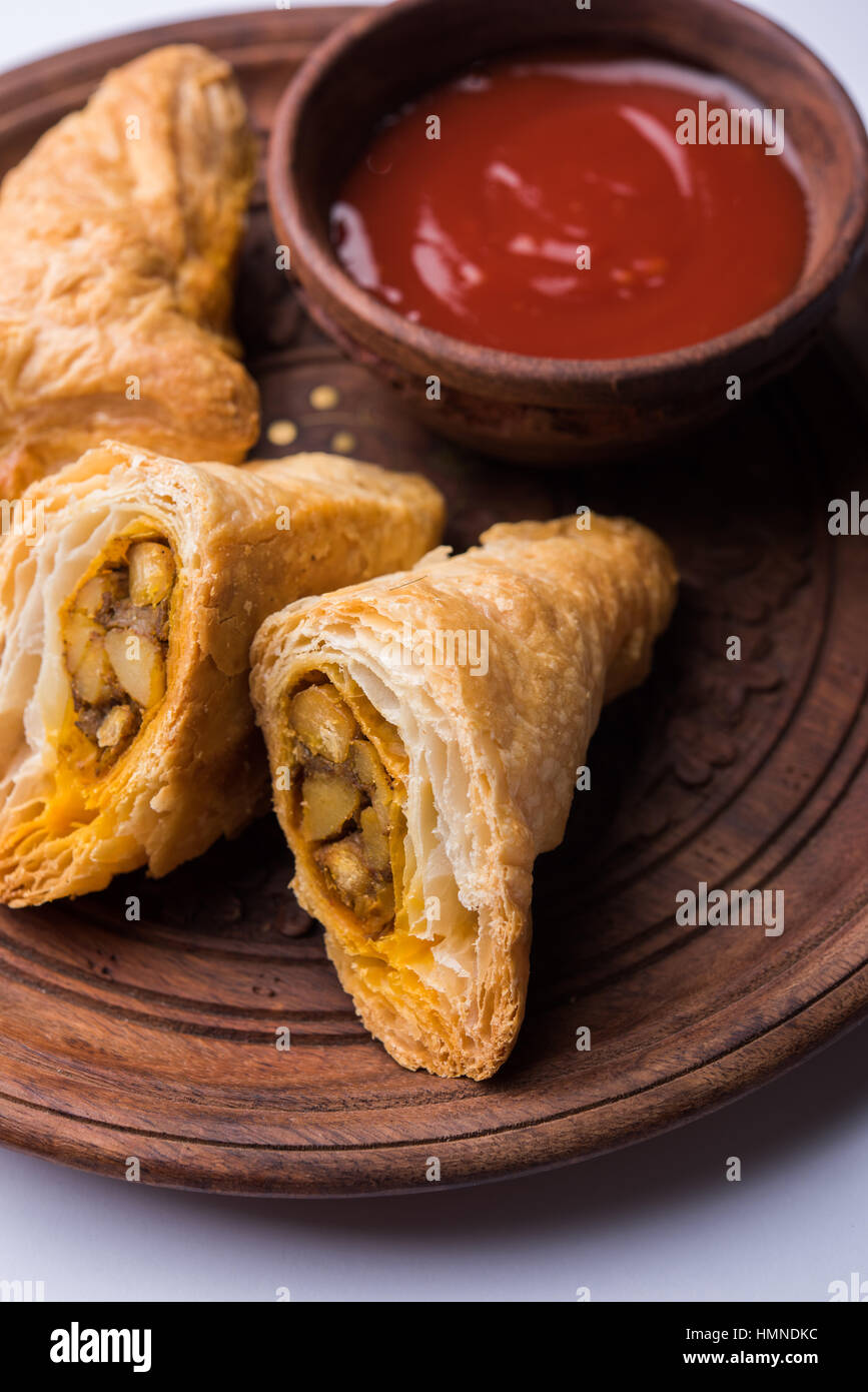 stuffed vegetable or veg puff or puf or samosa, famous indian snack ...