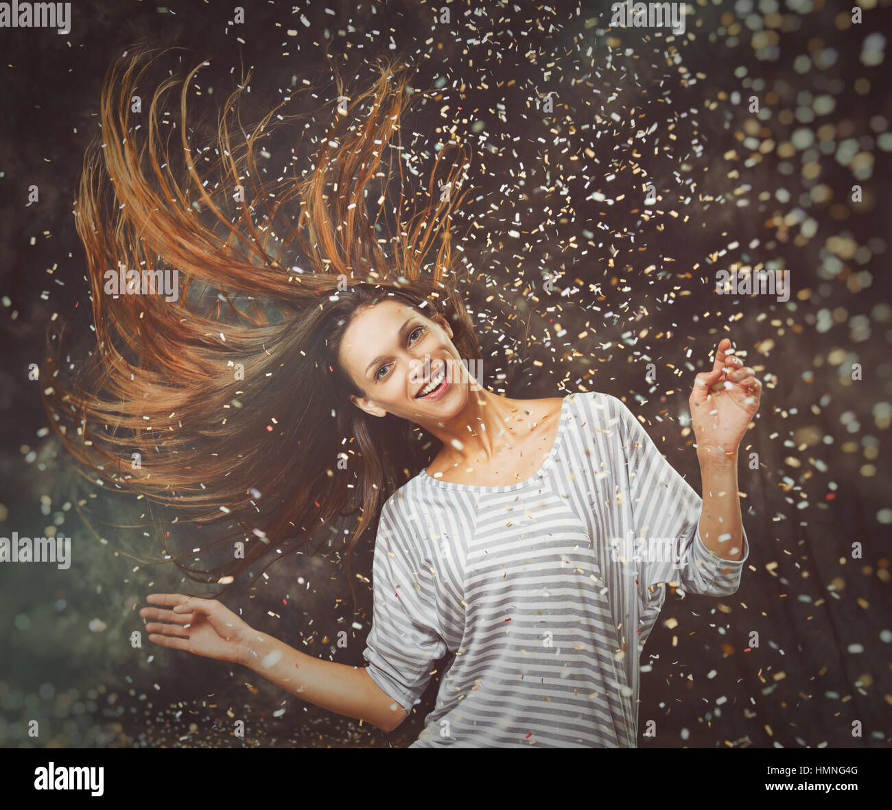 Girl throwing confetti hi-res stock photography and images - Alamy