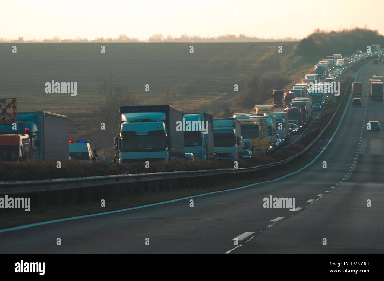 One-way Traffic Jam on the Motorway with Police Car Early Evening Stock ...