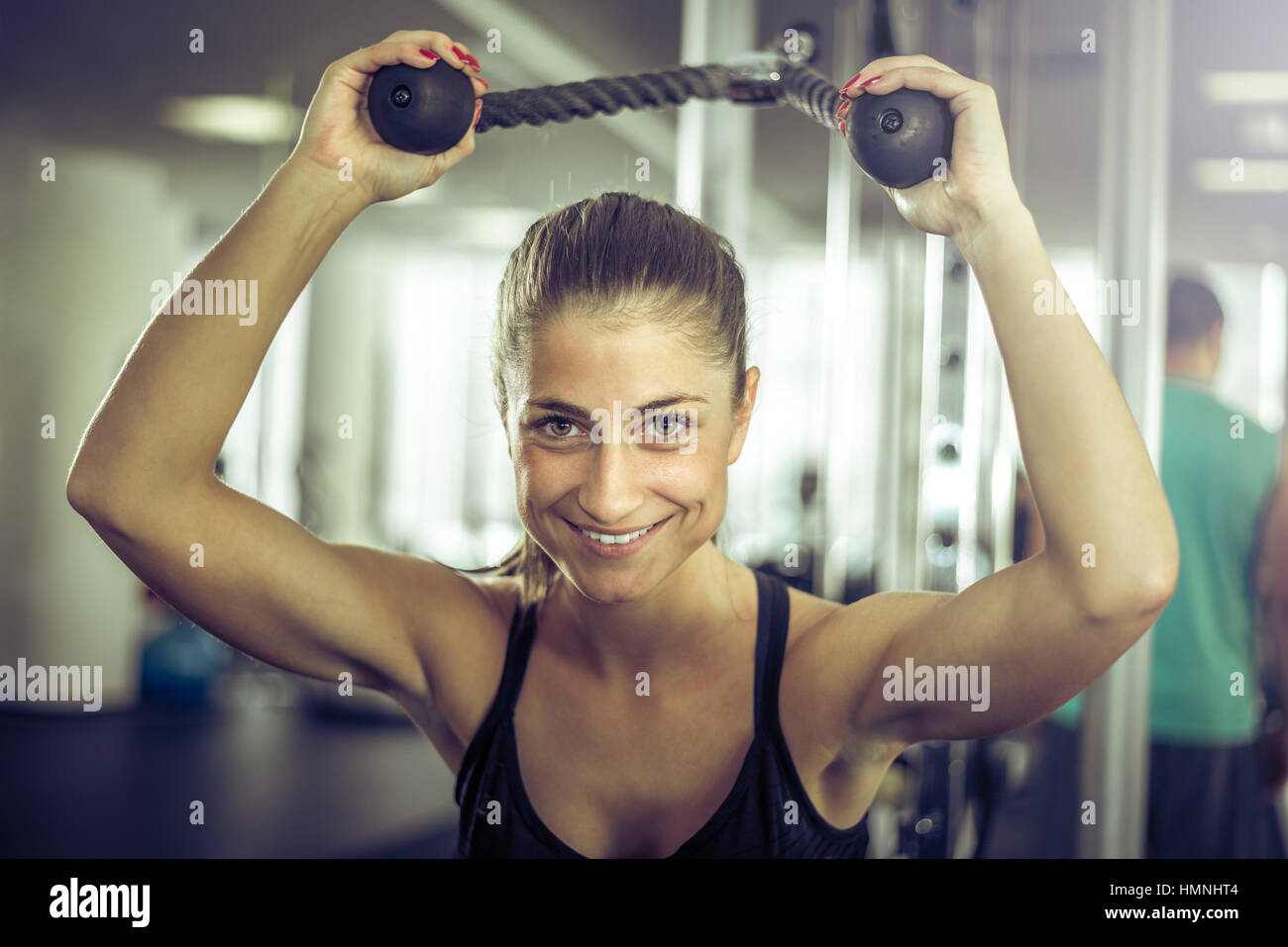 Girl doing overhead rope extension Stock Photo - Alamy