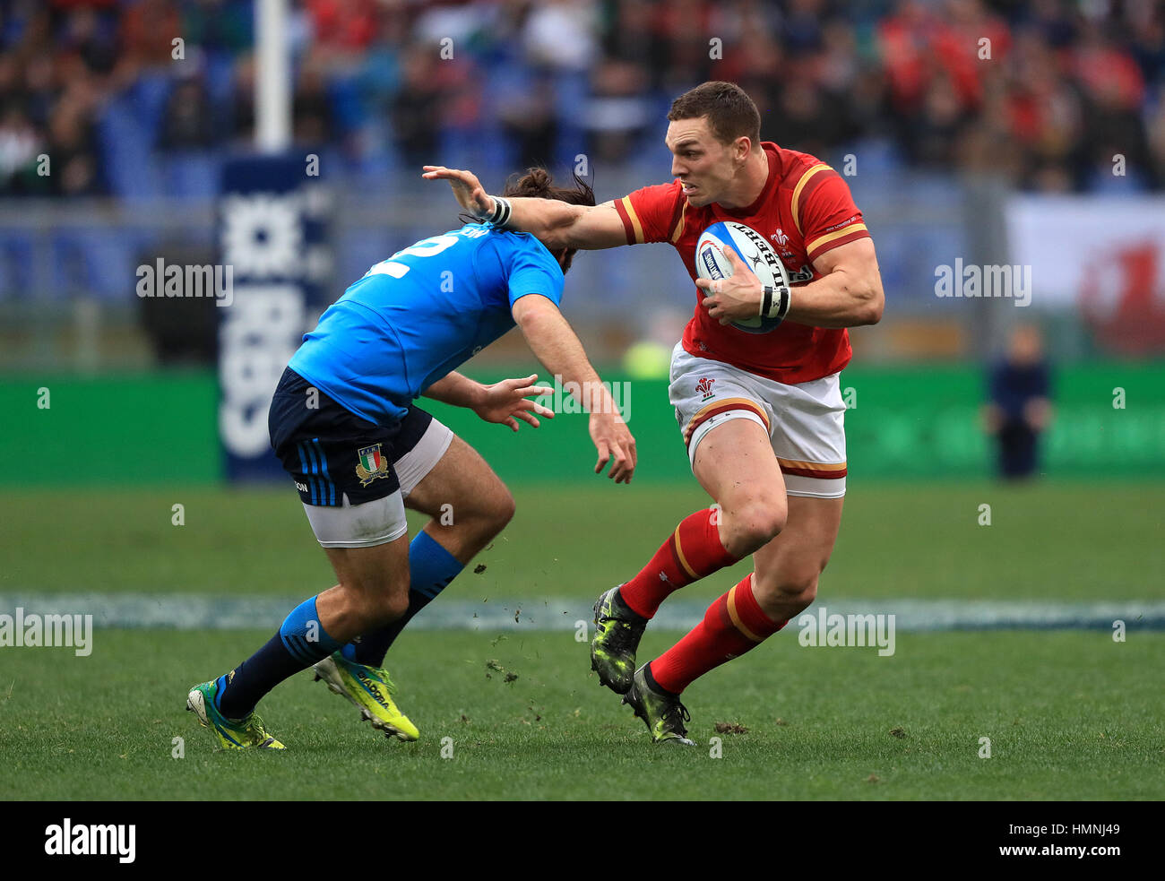 Wales' George North (right) and Italy's Luke McLean (left) in action ...