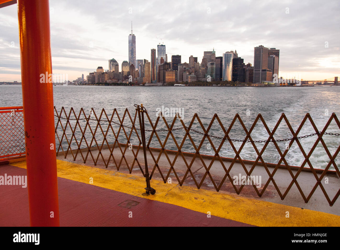 Manhattan island photographed at dawn from the Staten island ferry, New ...