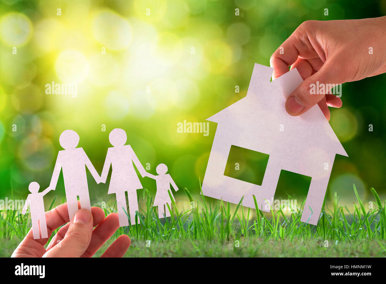 Home and family concept with paper house and family with nature ...