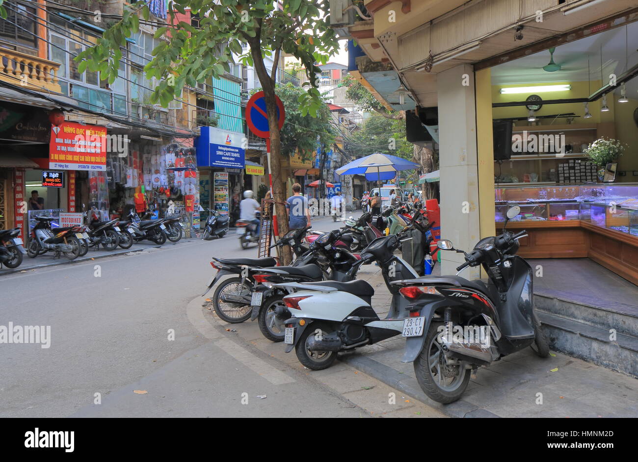 People visit Hang Bac shopping street in Hanoi Vietnam. Hang Bac street ...