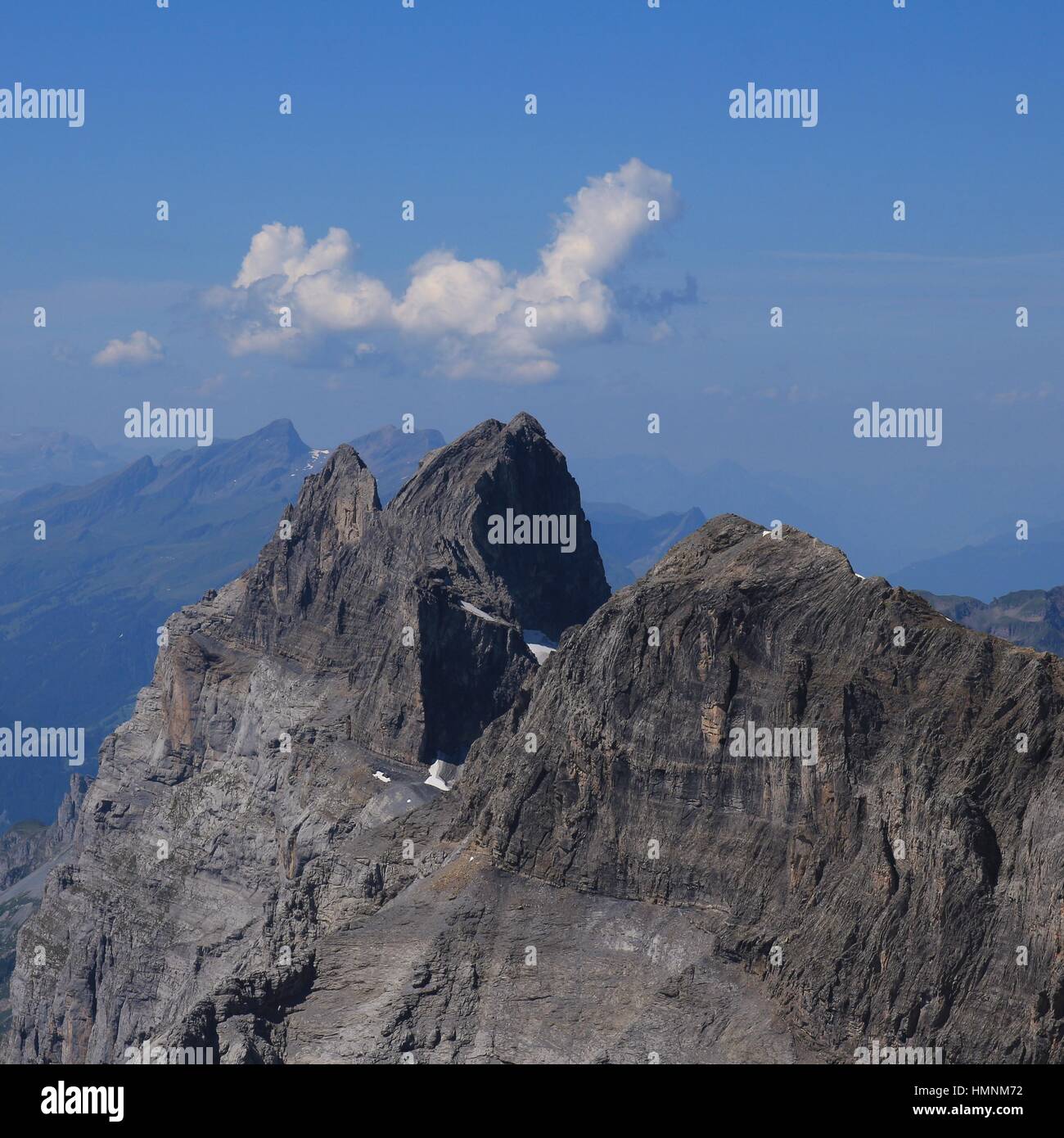 View from mount Titlis. Summer cloud over mount Wendenstocke Stock ...