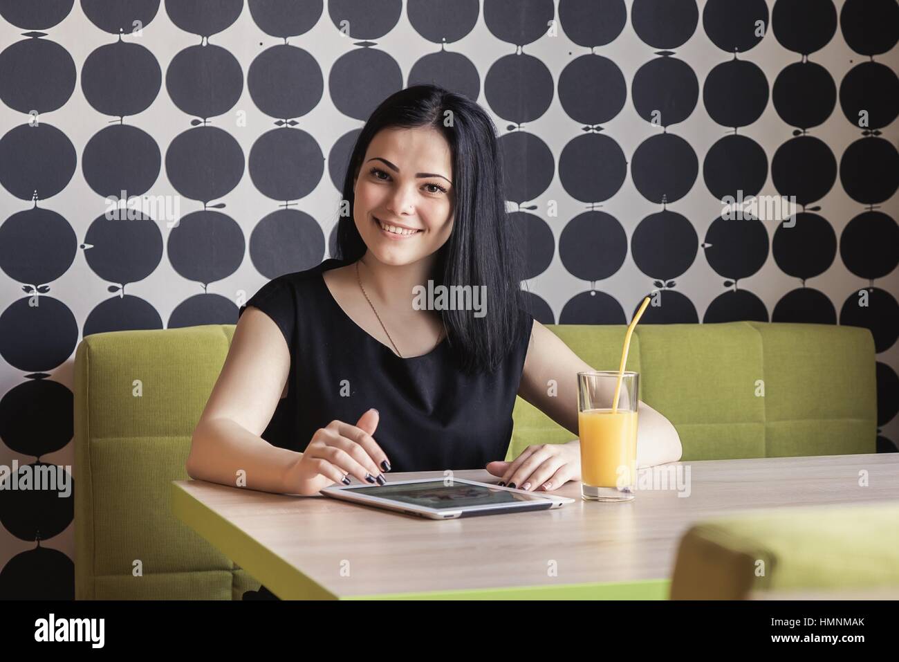 Positive girl smiling on camera Stock Photo - Alamy