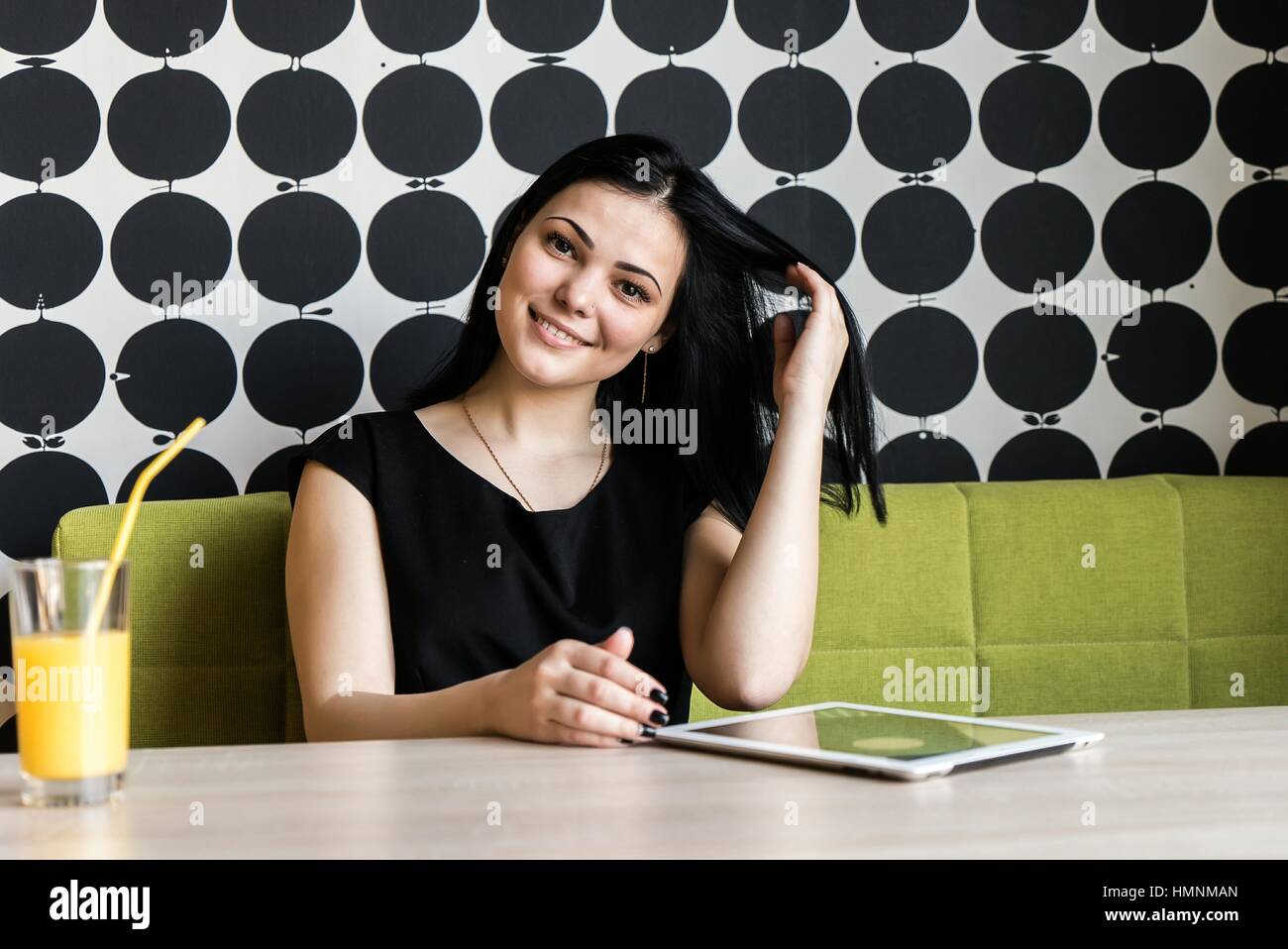 Positive girl smiling on camera Stock Photo - Alamy