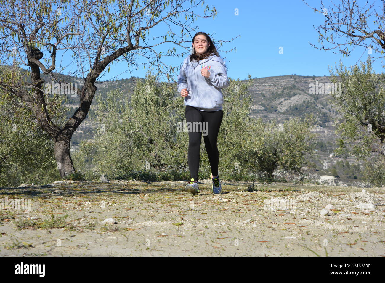 Black woman running towards camera hi-res stock photography and images ...