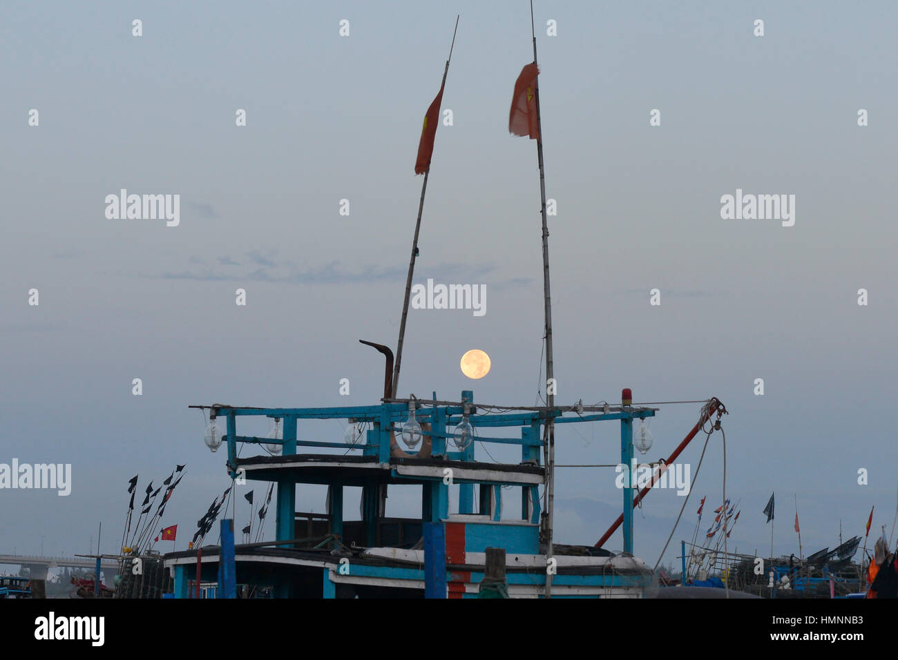Full moonset at dawn, Hoi An, Vietnam Stock Photo - Alamy