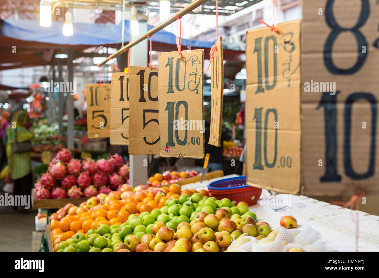Prices on placards at a fruit stall at market in Chow Kit, Kuala Lumpur ...