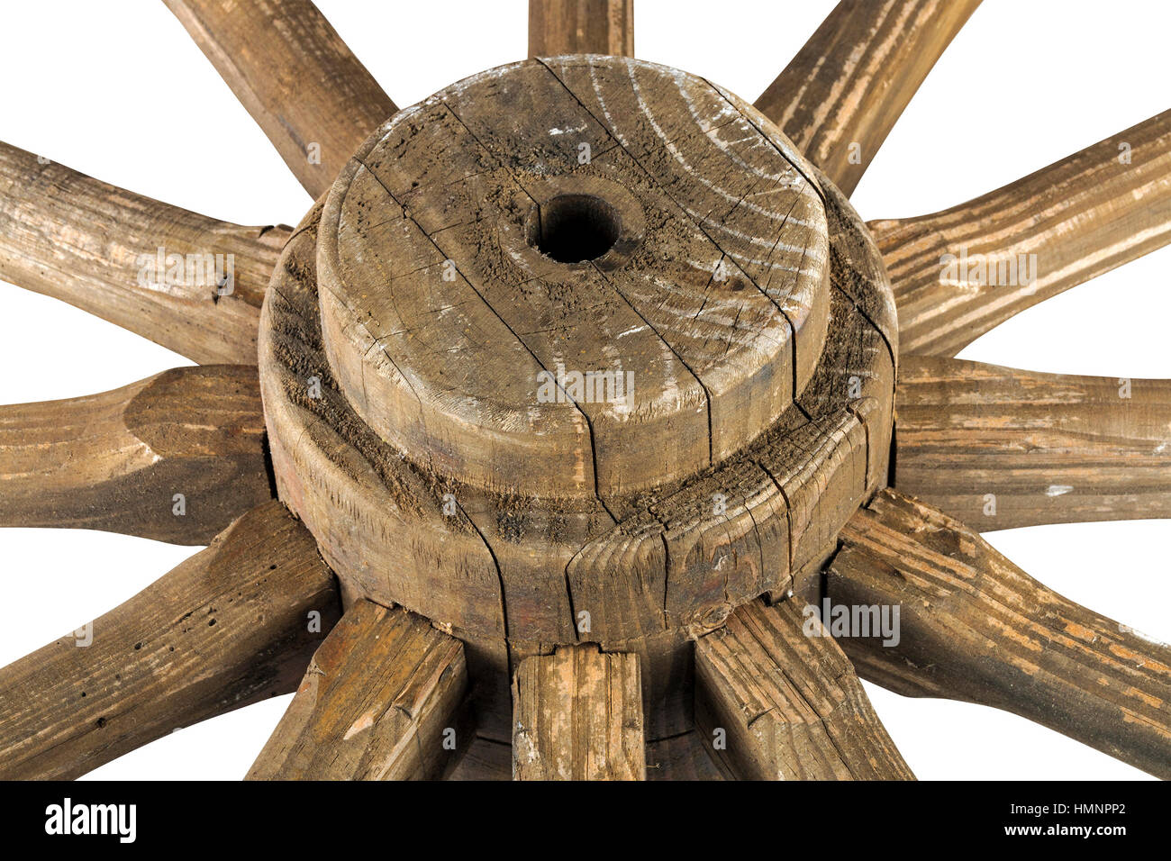 Close up section of hub and spokes of vintage wooden weathered ...