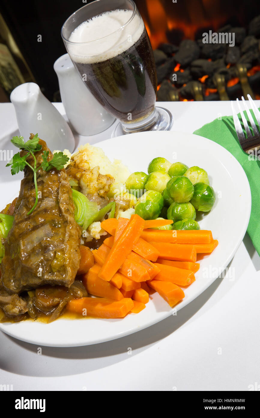 A pub/restaurant dish of Braised Beef Steak served with creamed potato ...