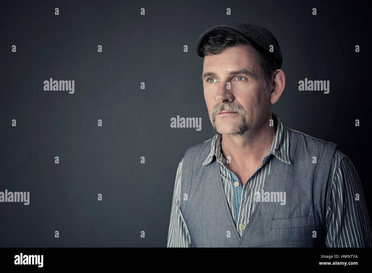 portrait of handsome stylish man in his 50s Stock Photo - Alamy