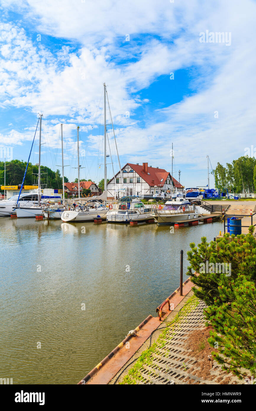 LEBA PORT, POLAND - JUN 21, 2016: sailing boats mooring in small Leba ...
