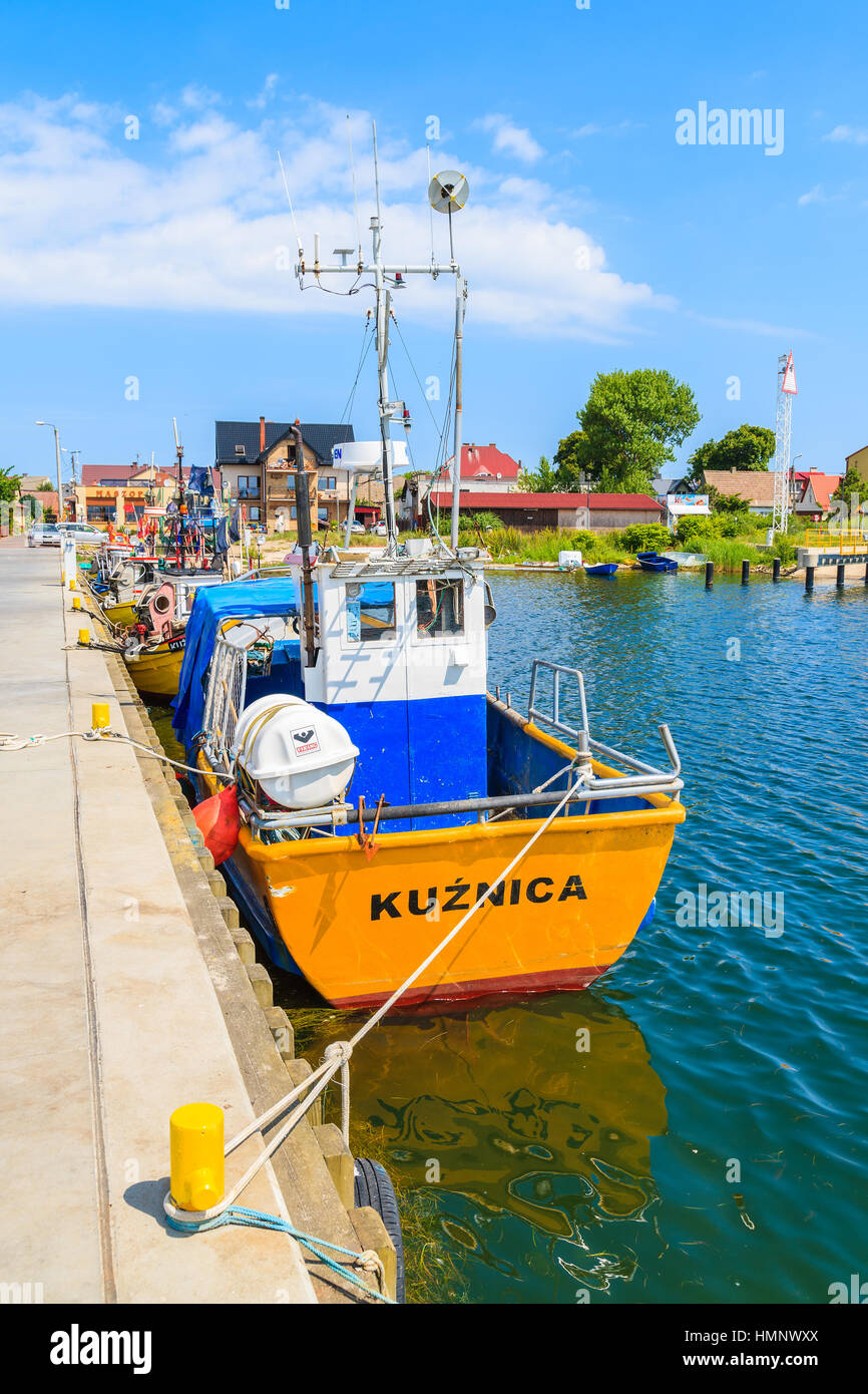 KUZNICA PORT, POLAND - JUN 22, 2016: Colorful fishing boats anchoring ...