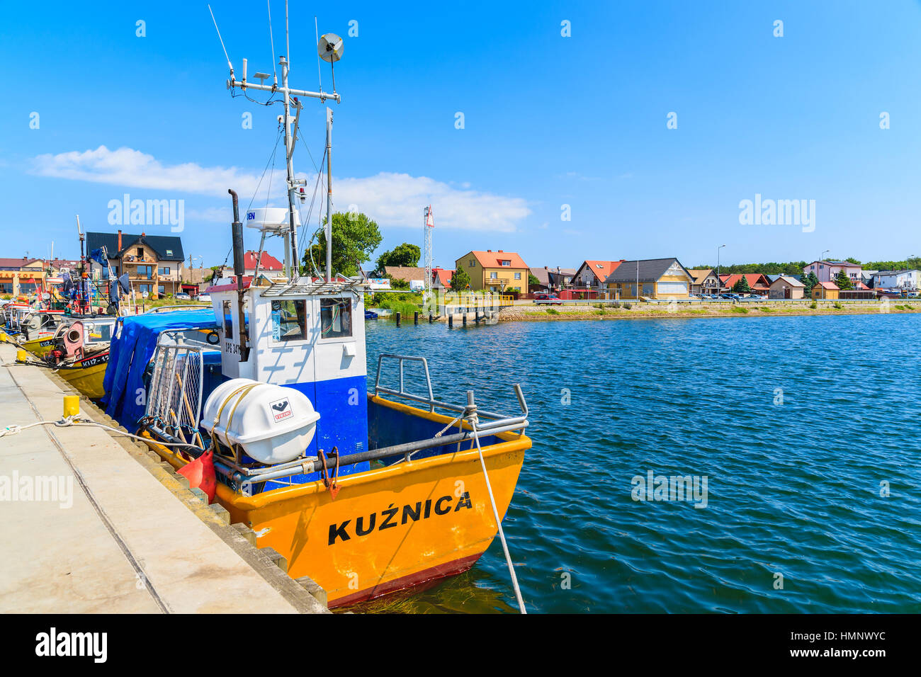 KUZNICA PORT, POLAND - JUN 22, 2016: Colorful fishing boats anchoring ...