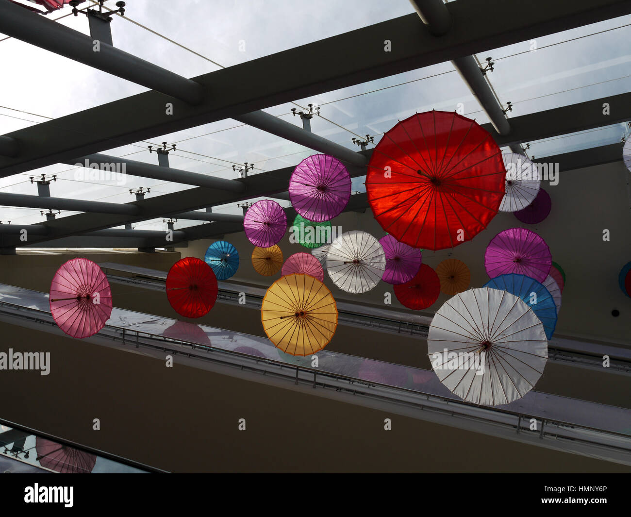 Colored parasols suspended from the ceiling of a mall in the Flushing ...