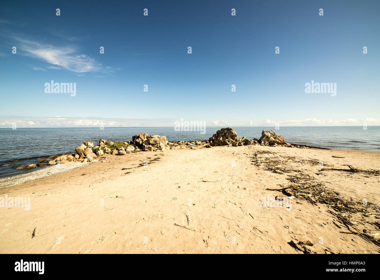 beach skyline with sand and perspective with clouds Stock Photo - Alamy
