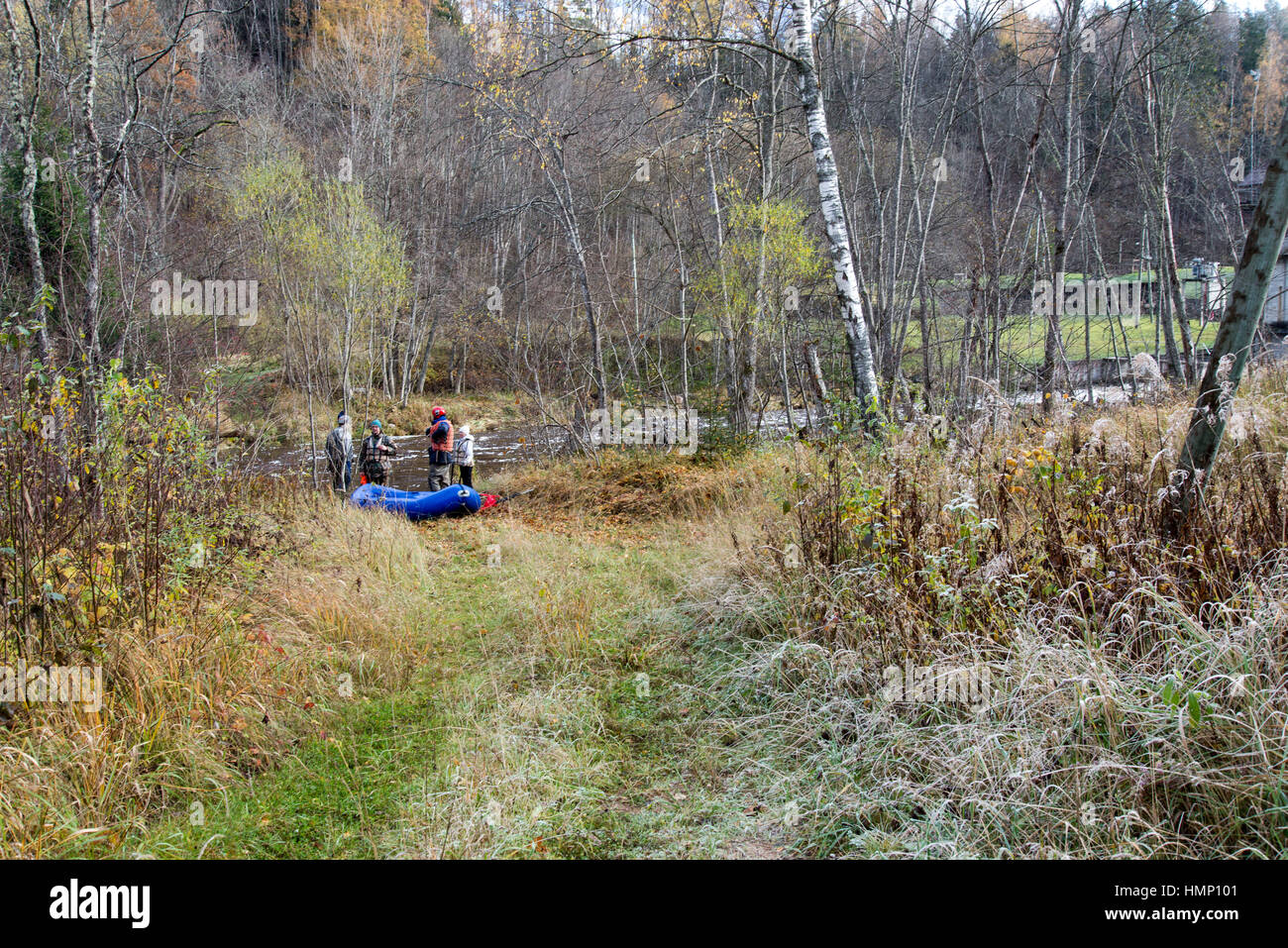 tourists enjoying water sports, kayaking in wild river - Sigulda ...