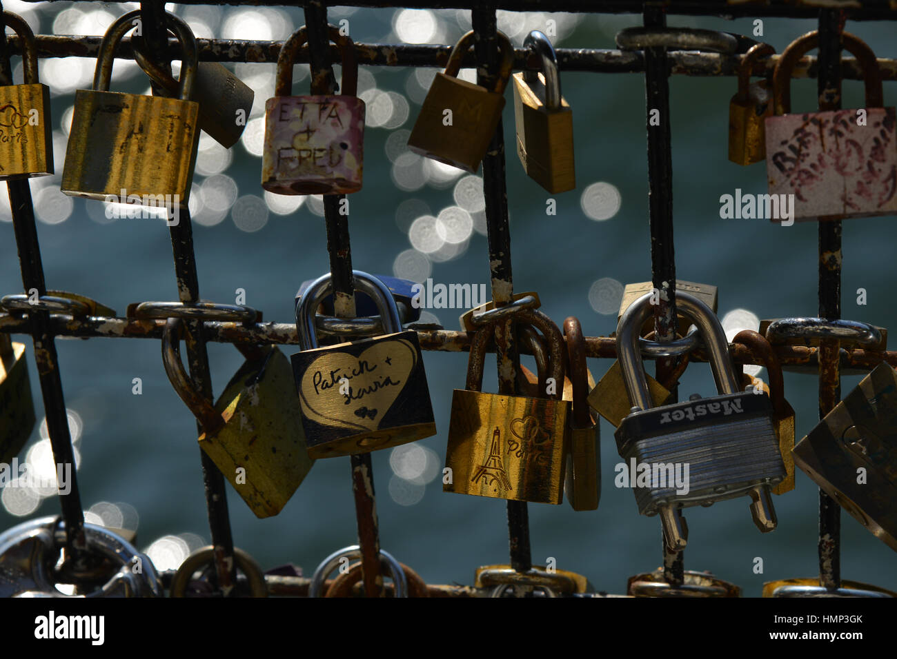 Romantic love locks on a bridge over the Seine in Paris, the city of ...