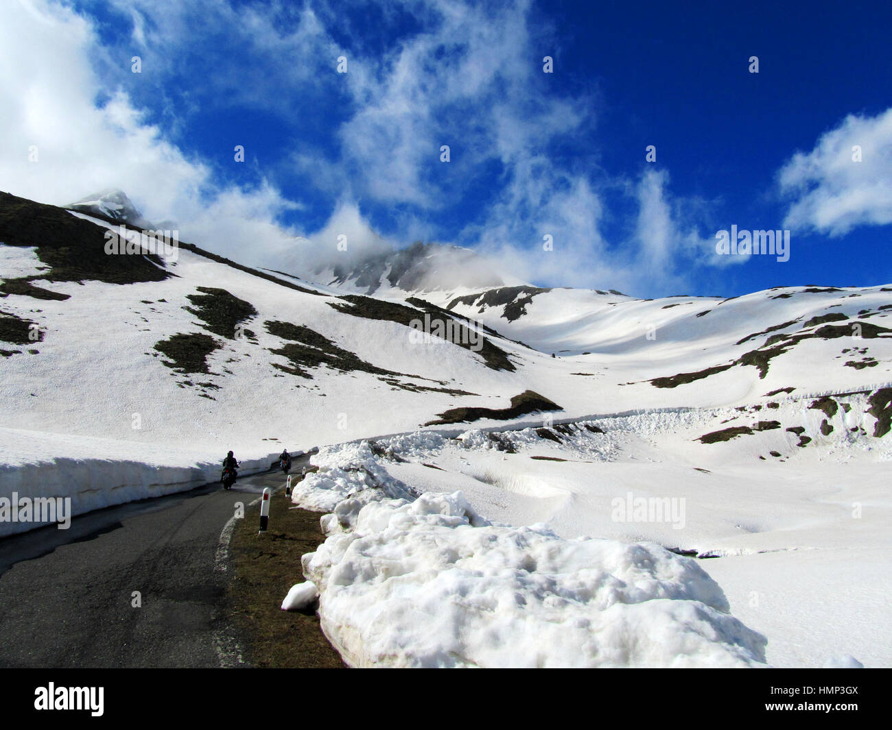 Road of Gavia Pass in Italy covered in snow Stock Photo - Alamy