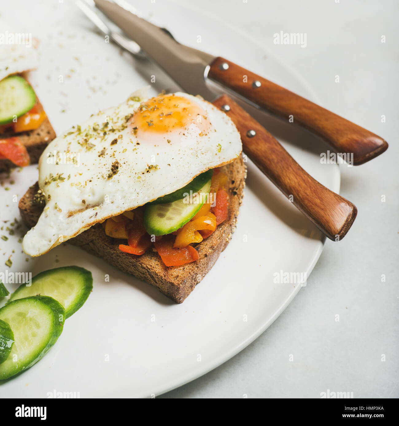 Breakfast toast with fried eggs, vegetables. square crop Stock Photo ...