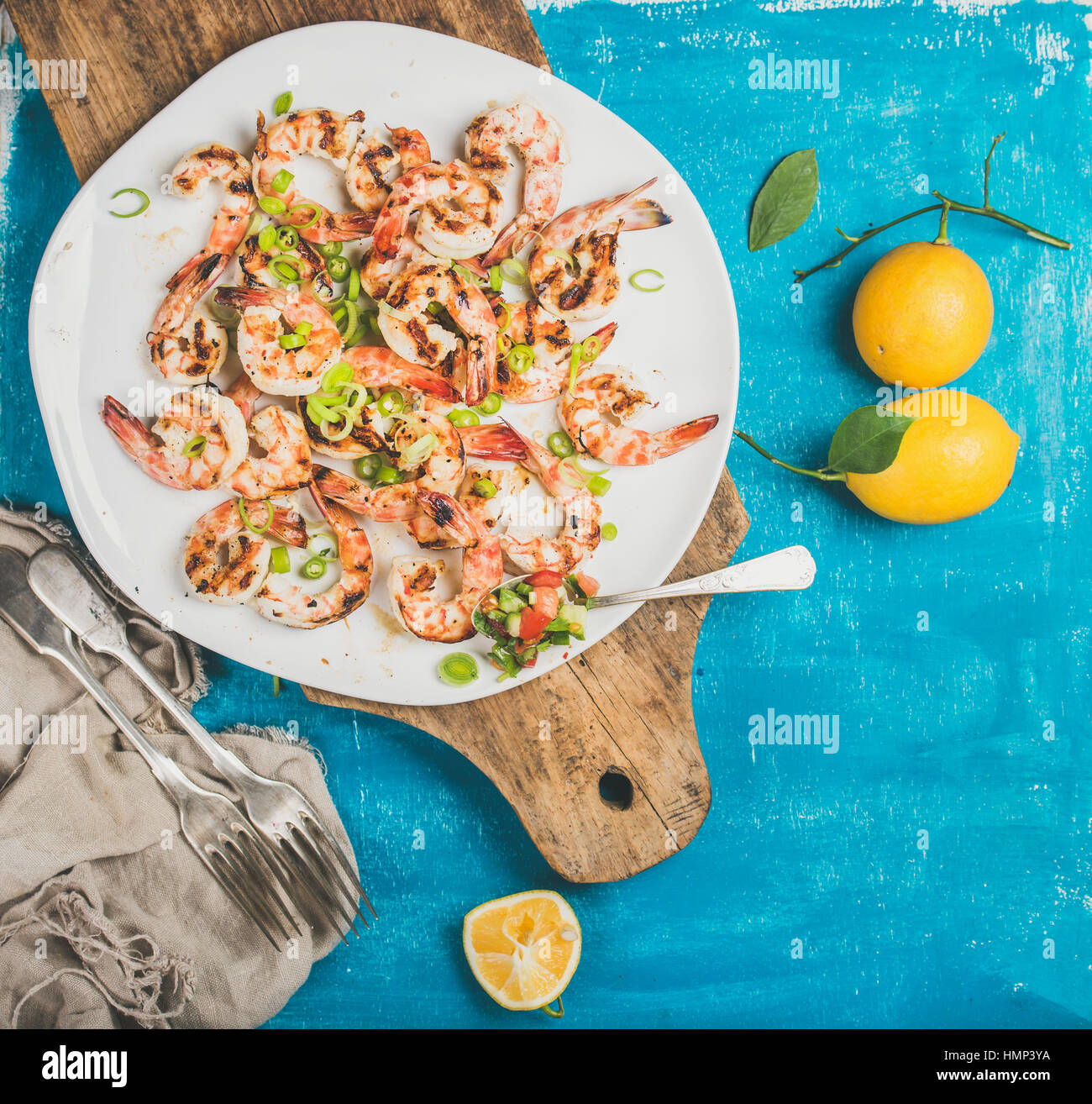 Seafood dinner with Grilled tiger, lemon, leek, chili pepper Stock ...