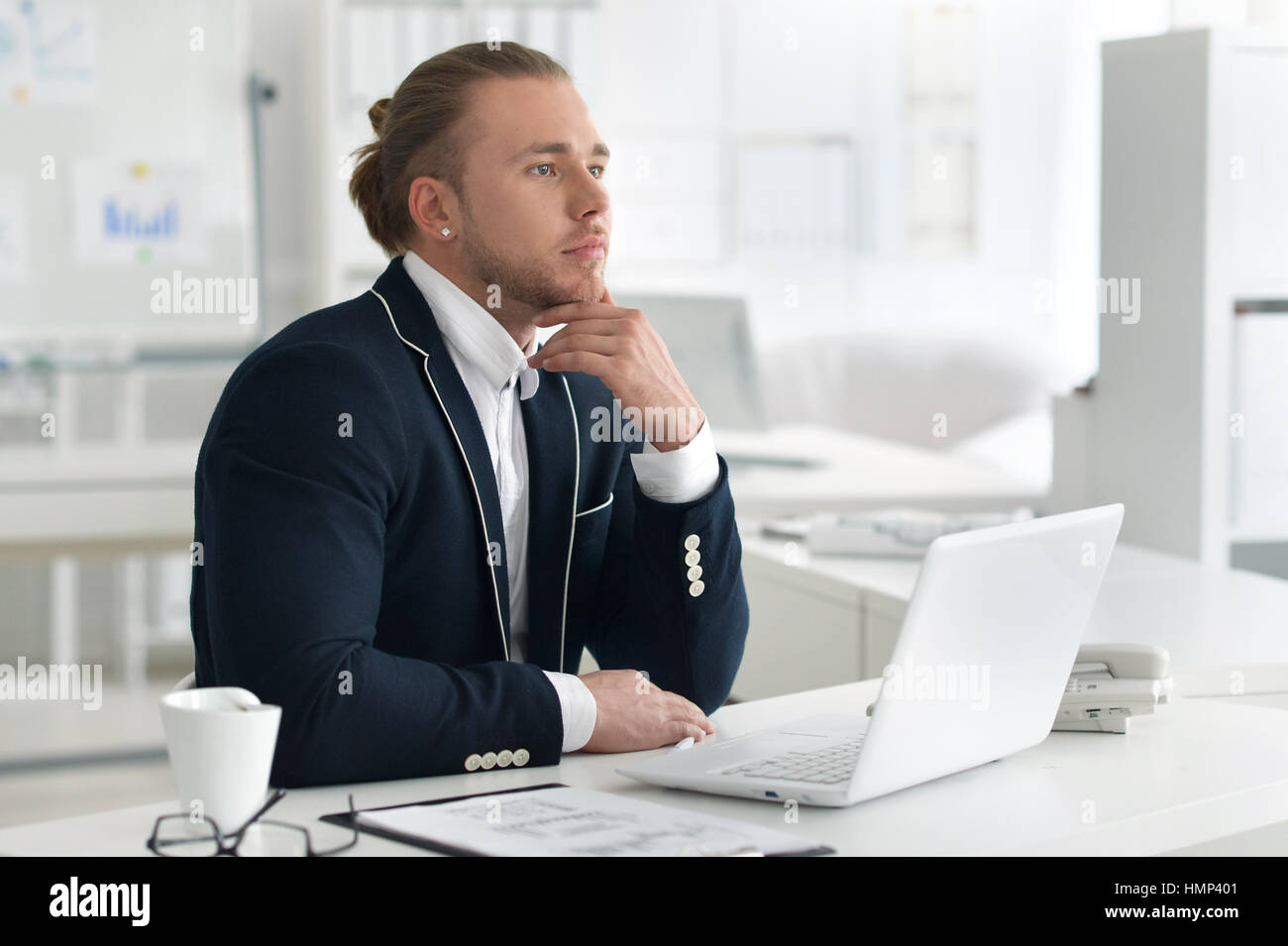 Young handsome office worker hi-res stock photography and images - Alamy