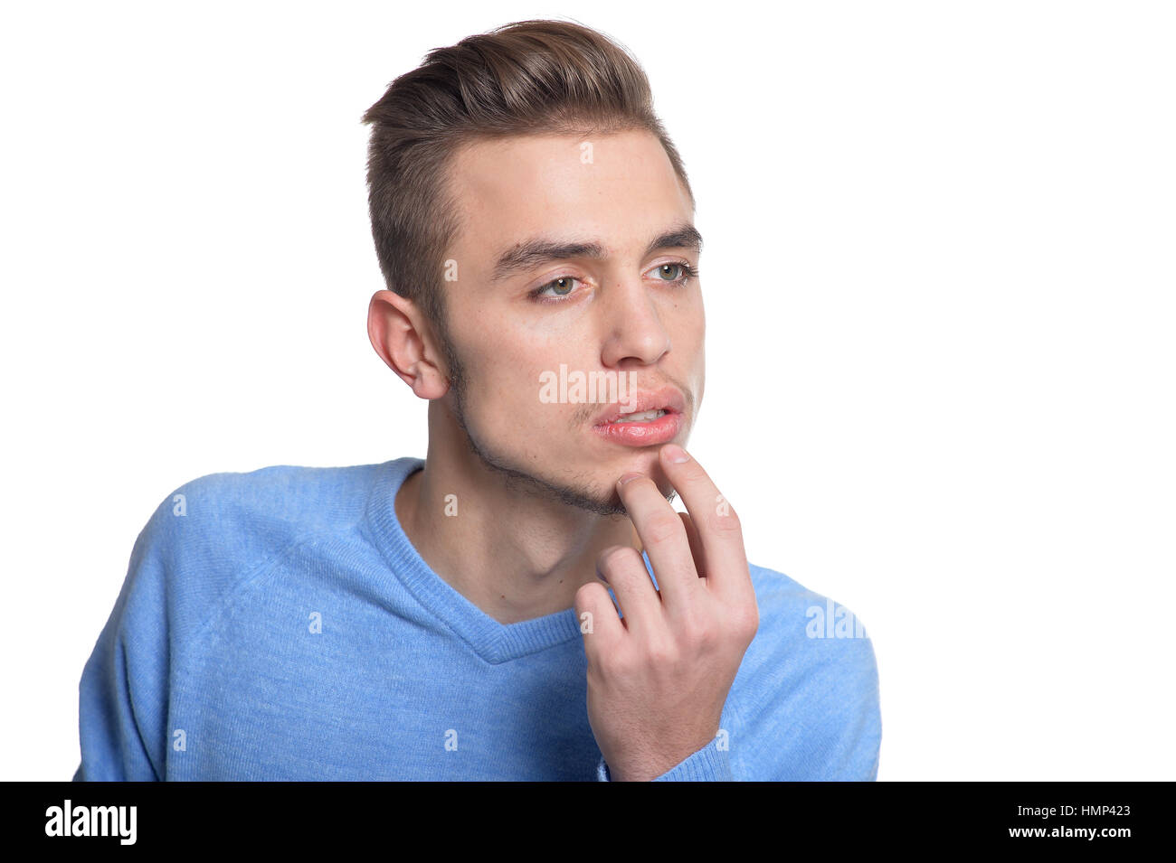 young man making facial expression Stock Photo - Alamy