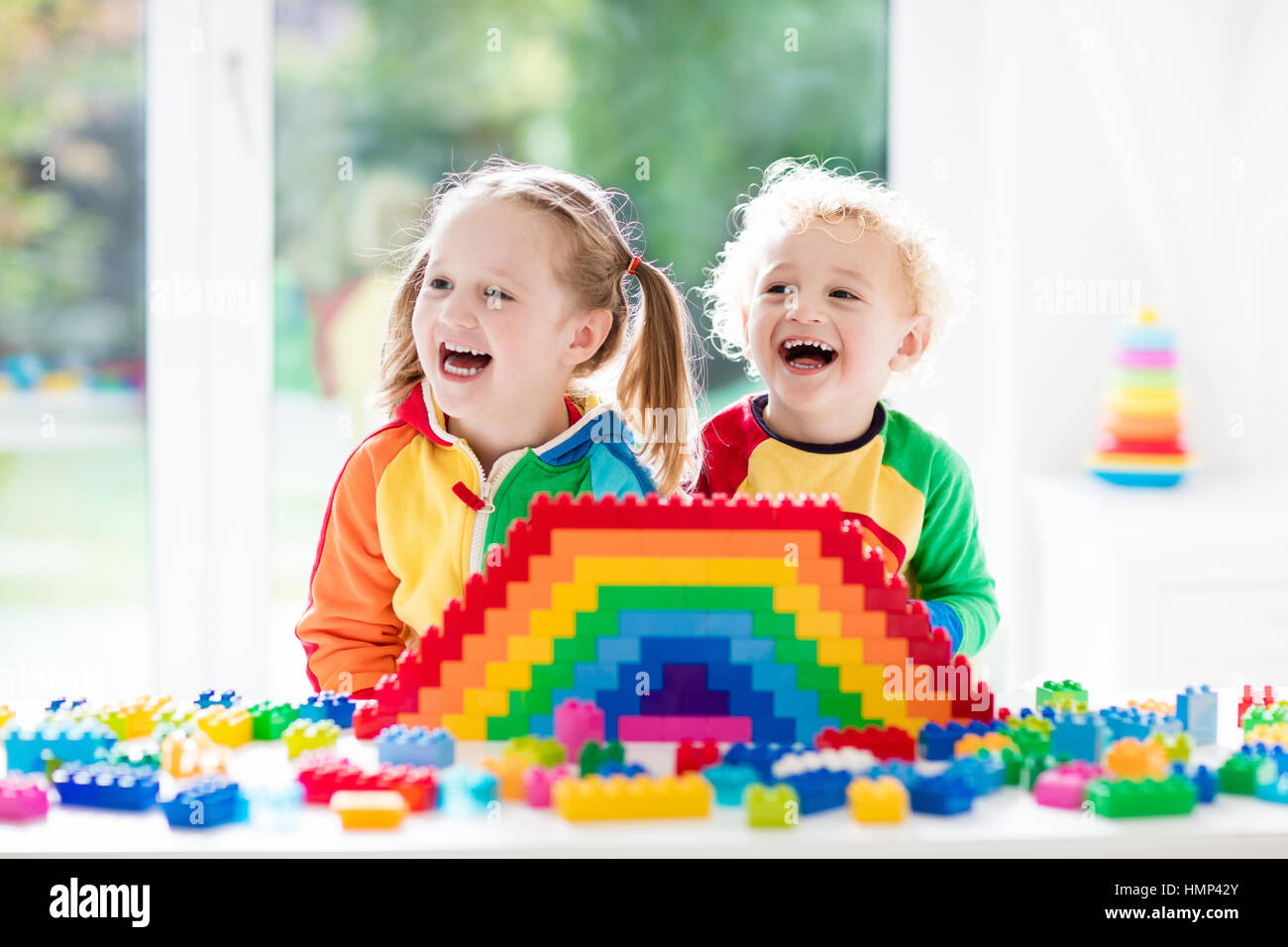 Kids playing with colorful blocks Stock Photo - Alamy Kids playing with colorful blocks Stock Photo - Alamy