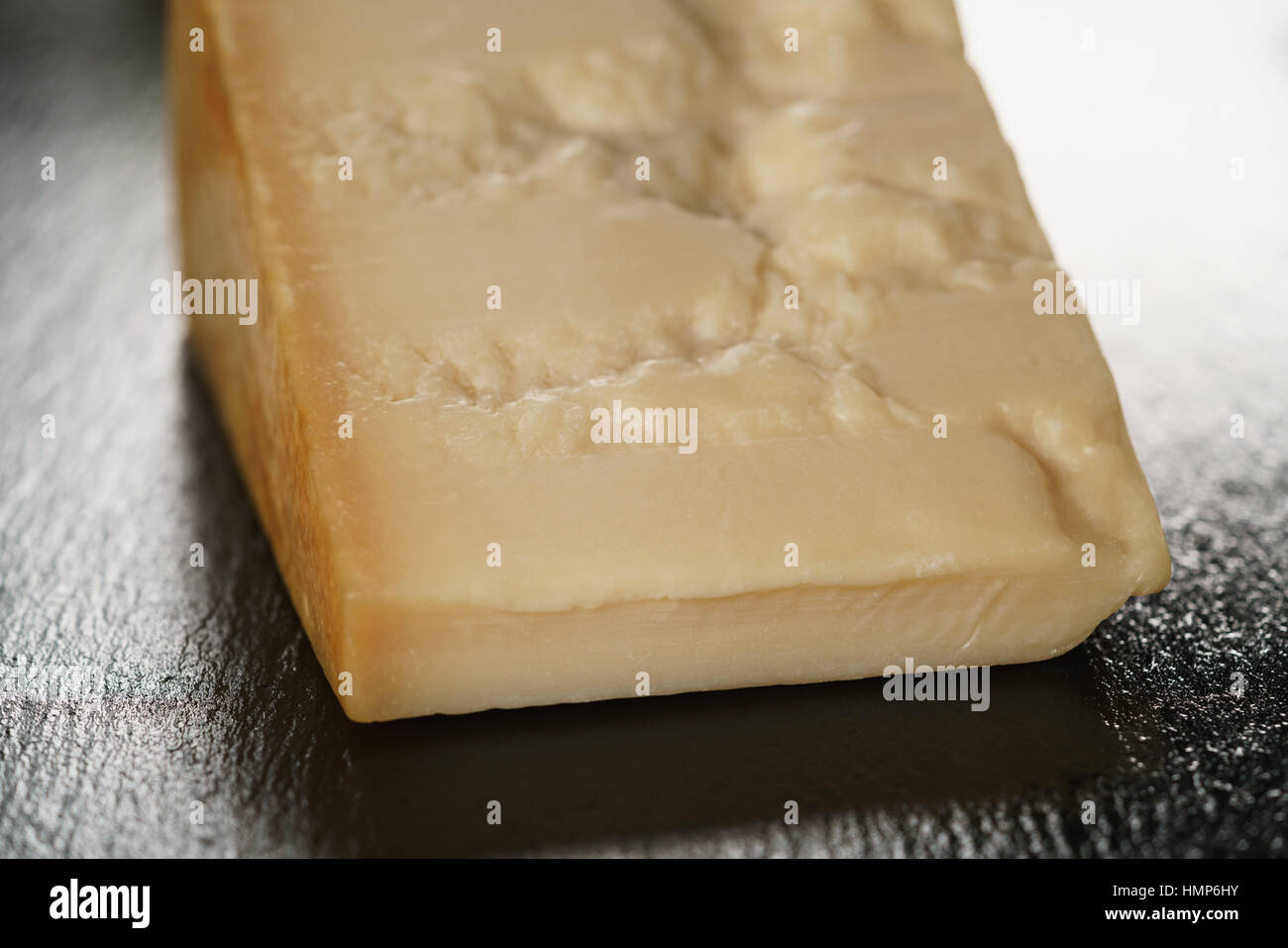 big chunk of italian parmesan cheese on slate board Stock Photo - Alamy