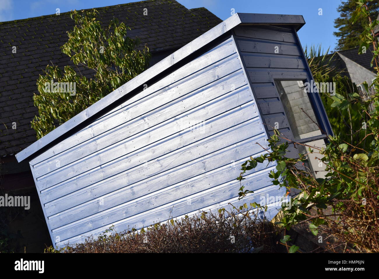 Blue shed in the distance Stock Photo - Alamy
