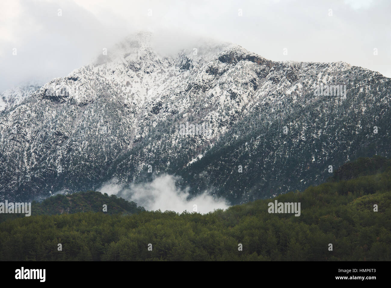 Green slopes of the Taurus mountains covered with snow Stock Photo - Alamy