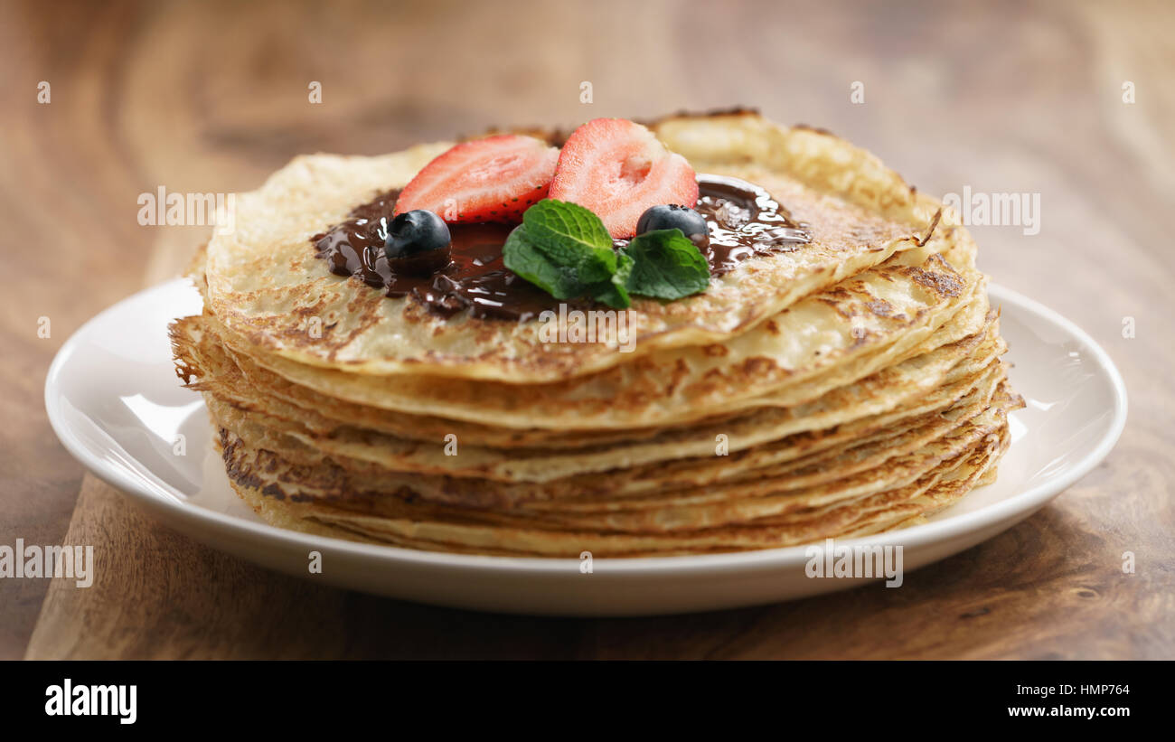 Chocolate crepes fresh strawberries hi-res stock photography and images ...