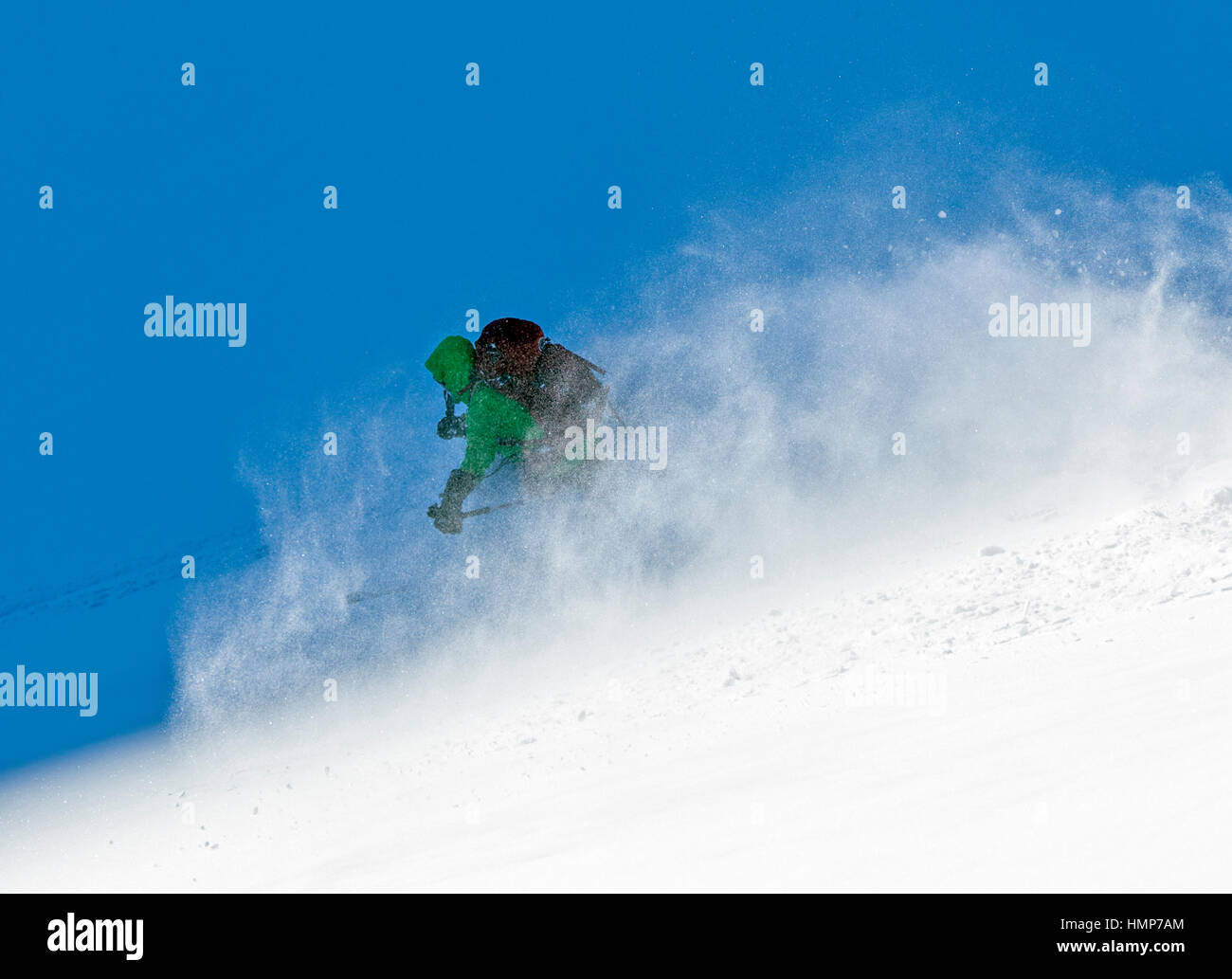 Female back country skier in fresh powder; Esplanade Range; Selkirk ...