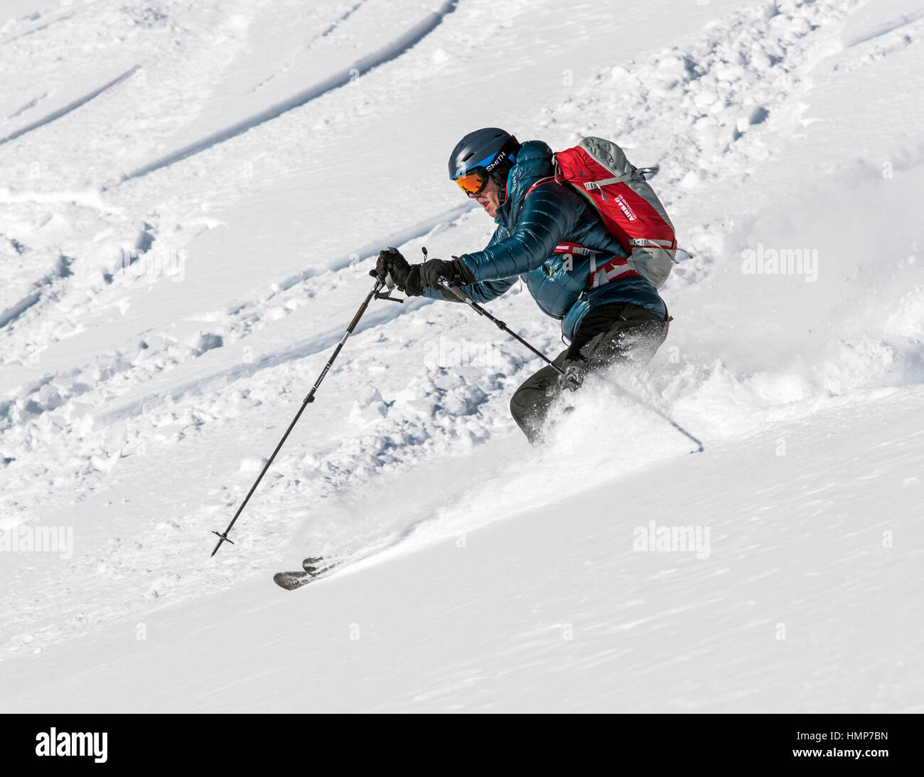 Male back country skier in fresh powder; Esplanade Range; Selkirk ...