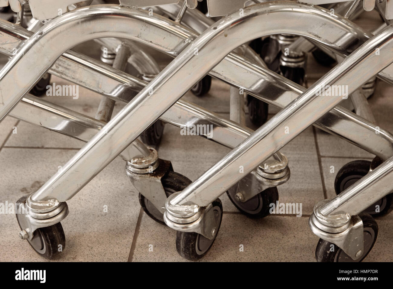 Many wheels of mall push carts closeup shot Stock Photo - Alamy