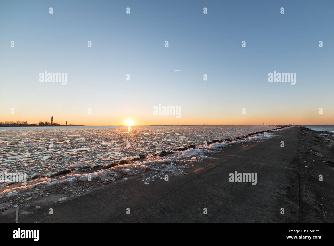 sunset over frozen sea with ice blocks and dramatic colorful sky Stock ...