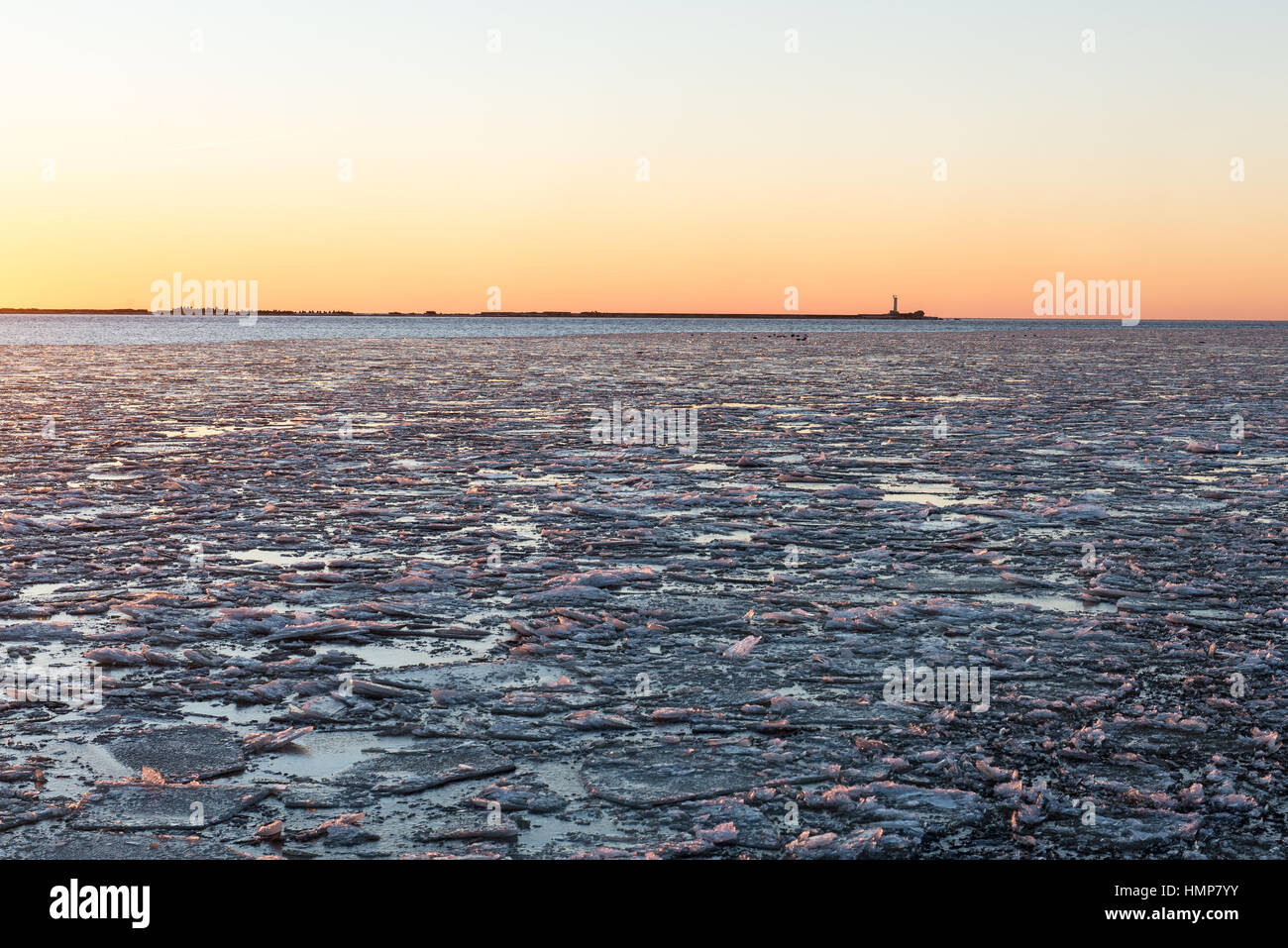 sunset over frozen sea with ice blocks and dramatic colorful sky Stock ...