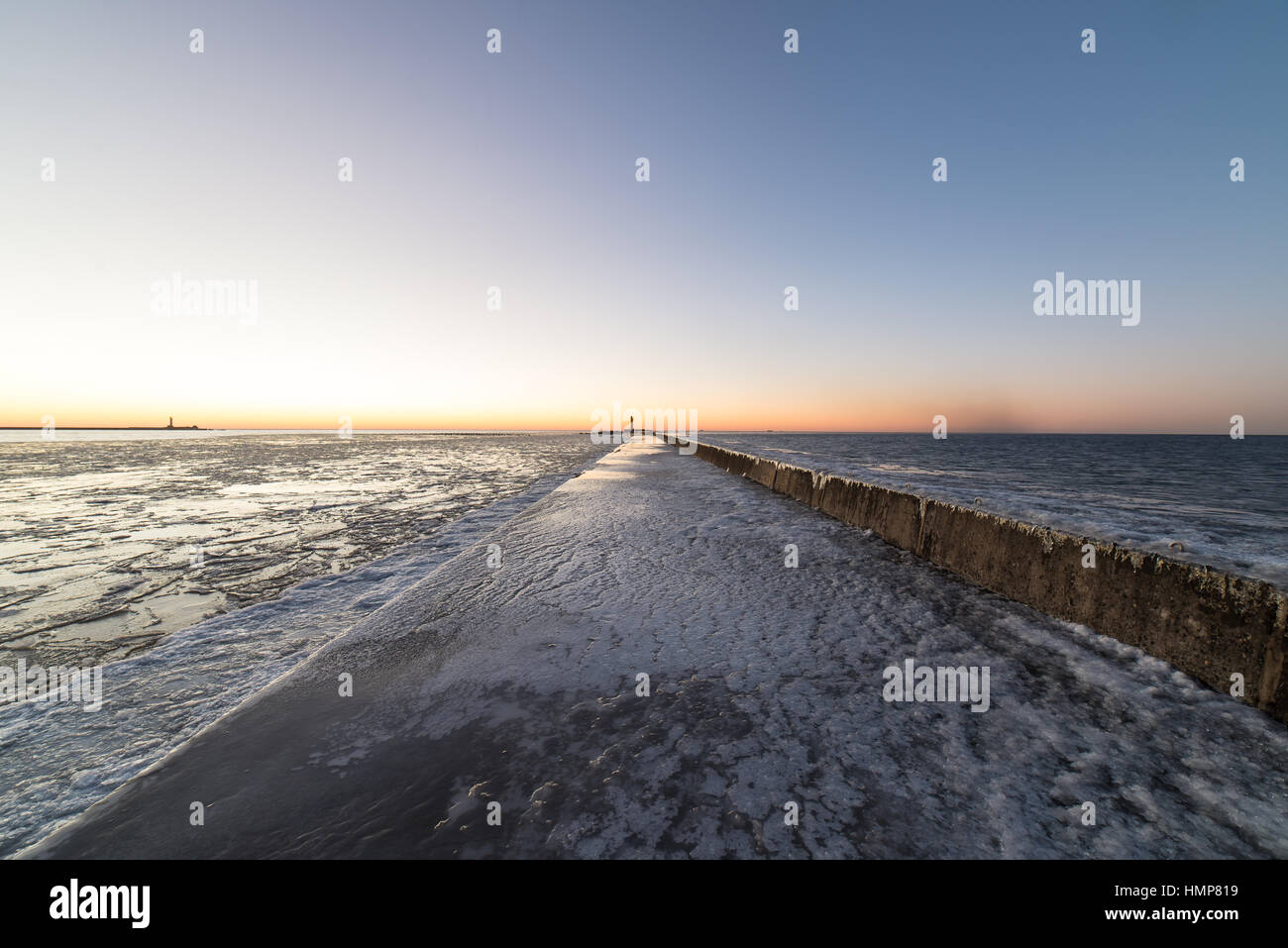 sunset over frozen sea with ice blocks and dramatic colorful sky Stock ...