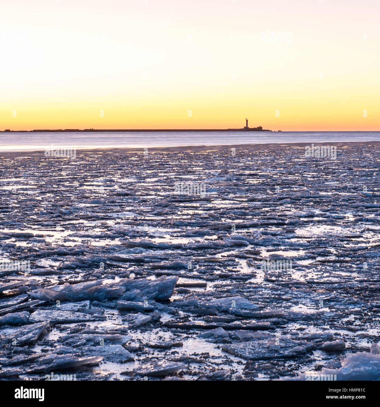 sunset over frozen sea with ice blocks and dramatic colorful sky Stock ...
